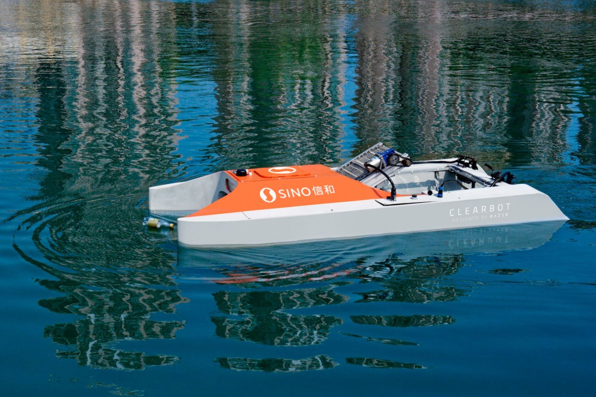 This AI-enabled robotic boat cleans up harbors and rivers to keep ...