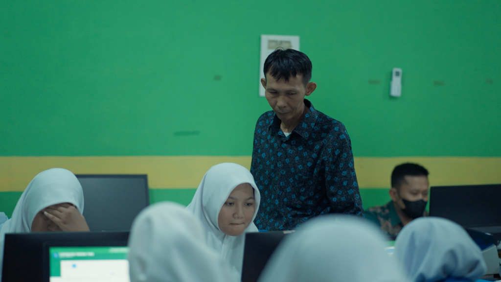 A man teaching in a classroom