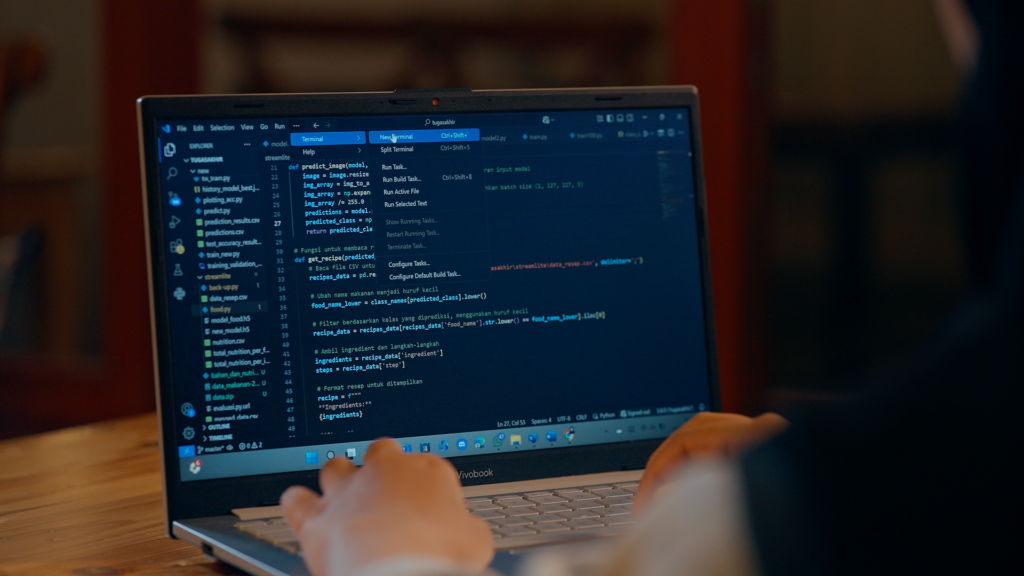 Laptop screen showing code